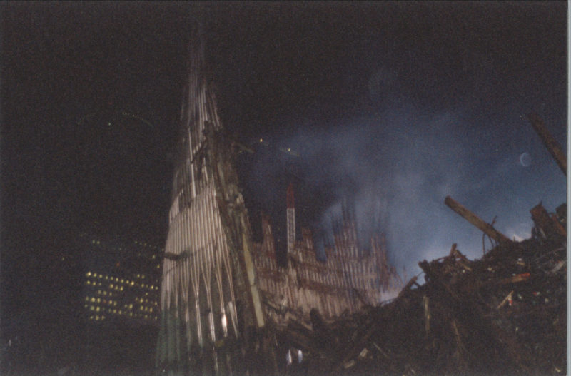Ground Zero at night- looking west towards remains of Tower 2 in front ...