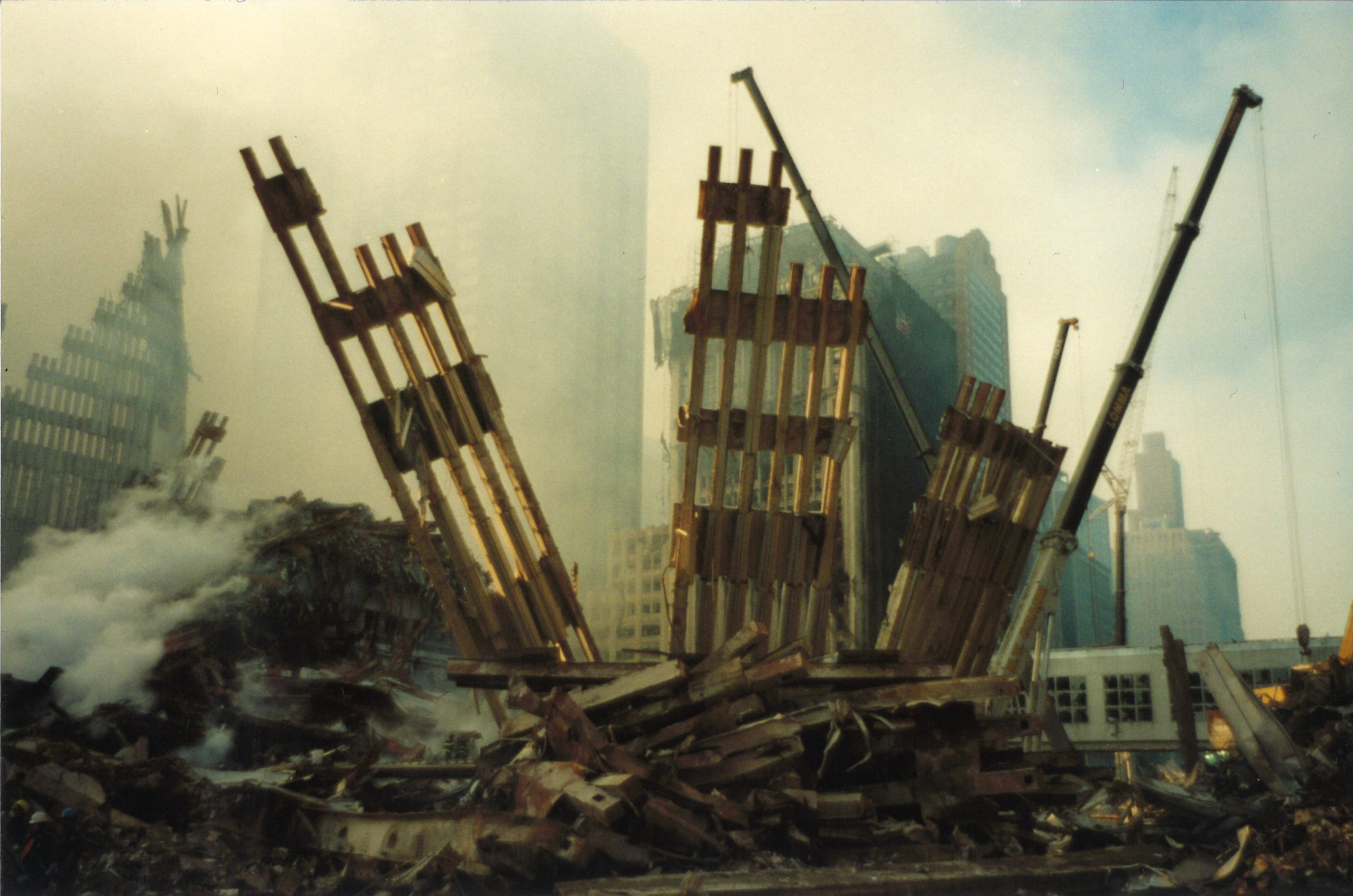 Damaged WTC buildings at Ground Zero looking South on West Street ...