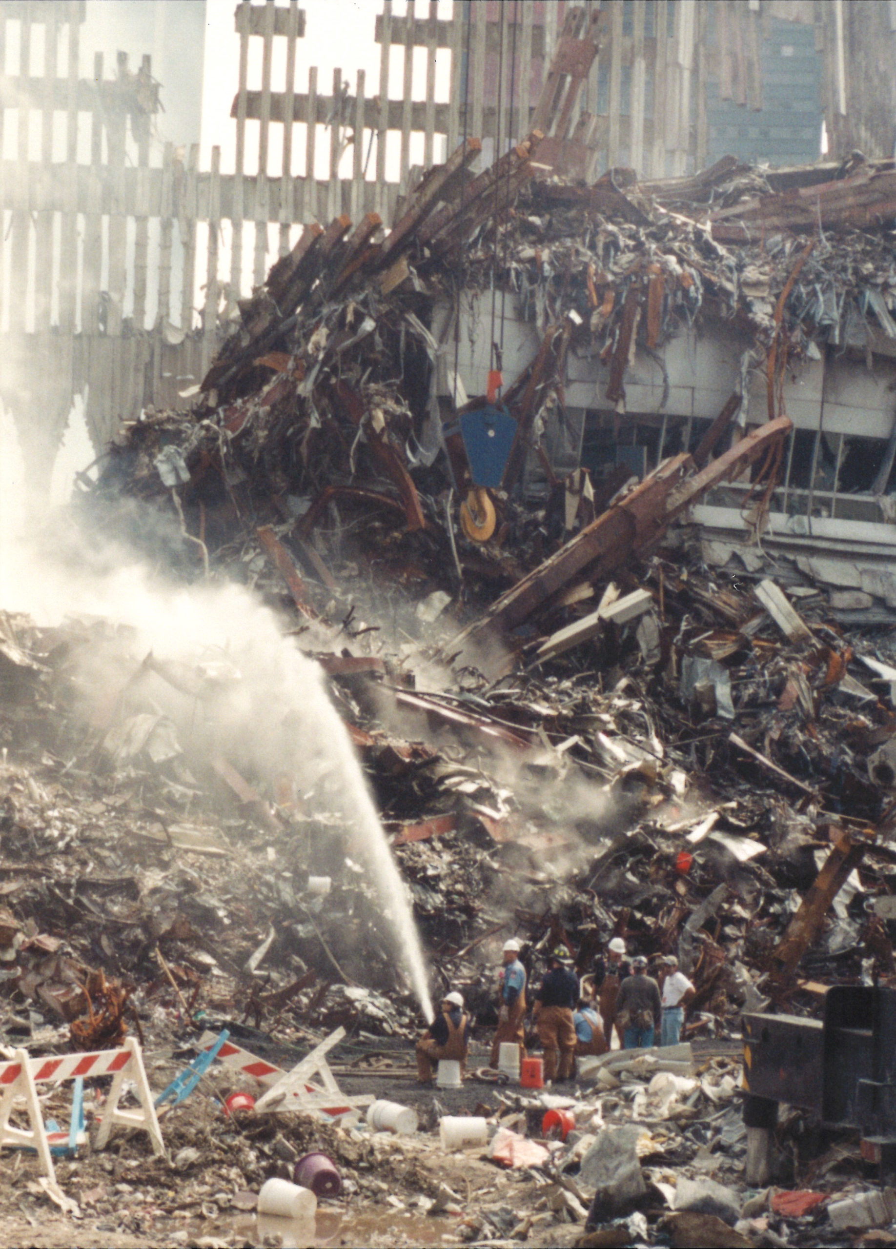 Workers with Water Hose at Ground Zero - Village Preservation