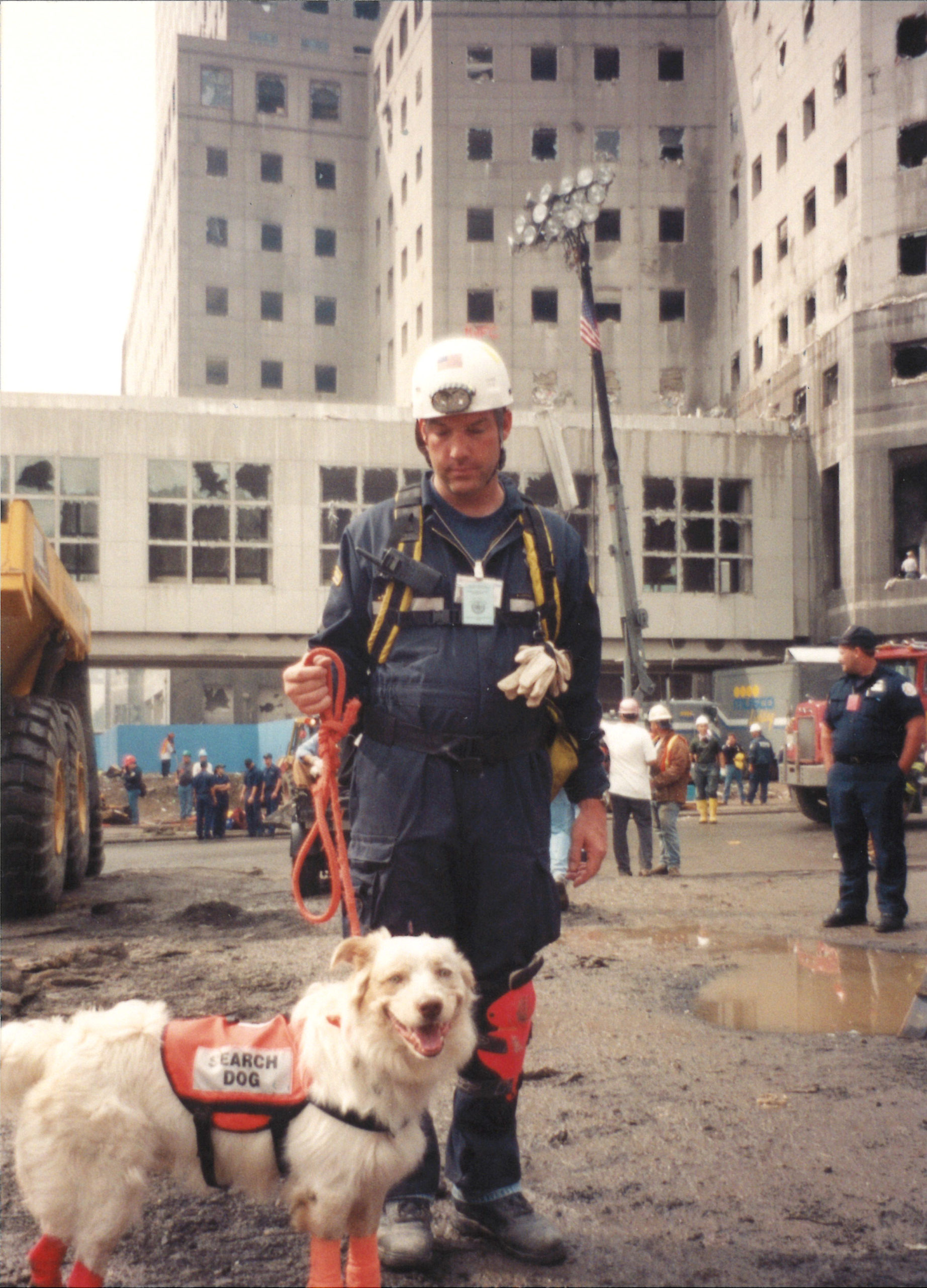 Handler and Rescue Dog at Ground Zero (2) - Village Preservation