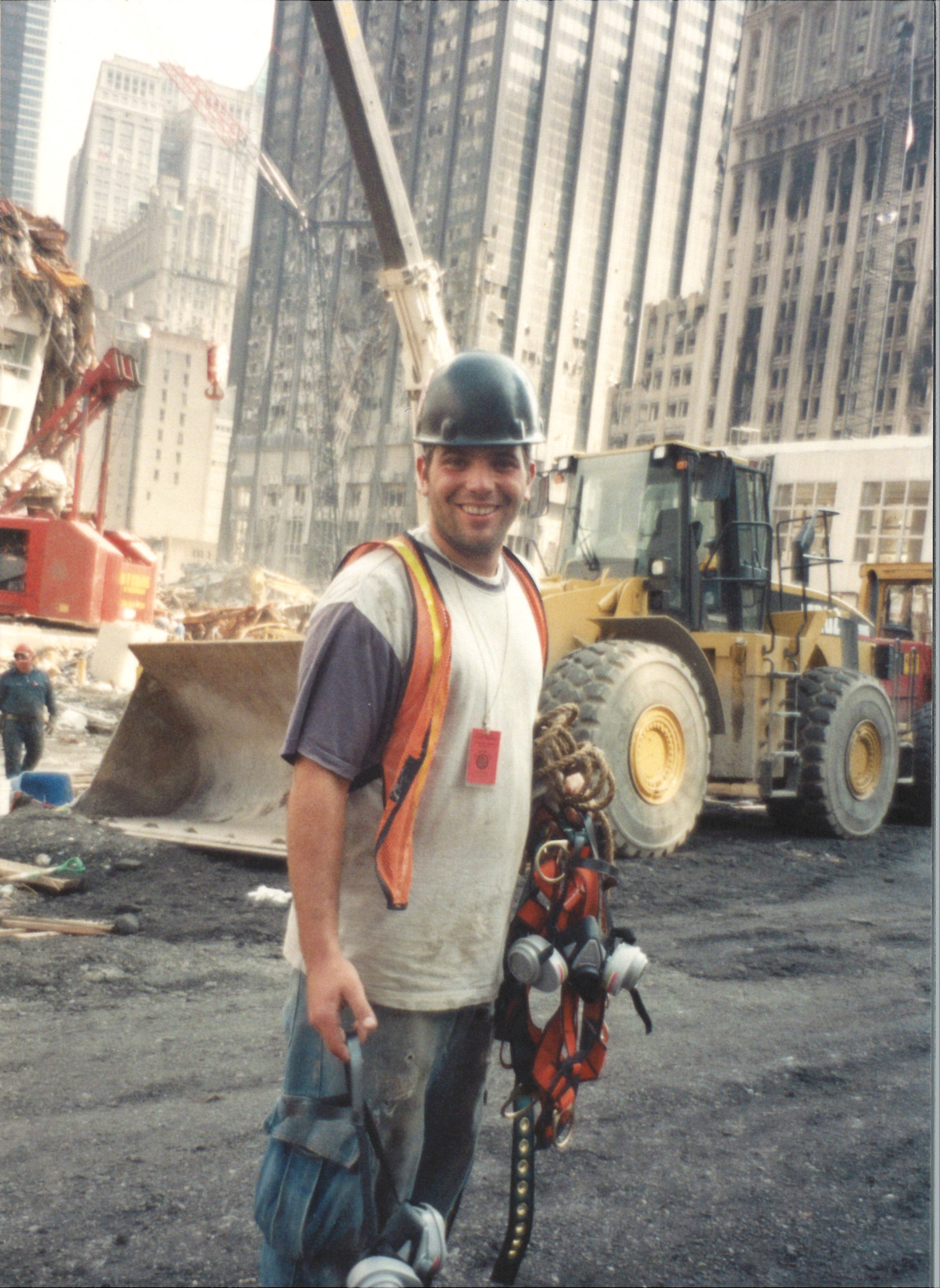 An Unknown Worker in Front of a Front Loader at Ground Zero - Village ...