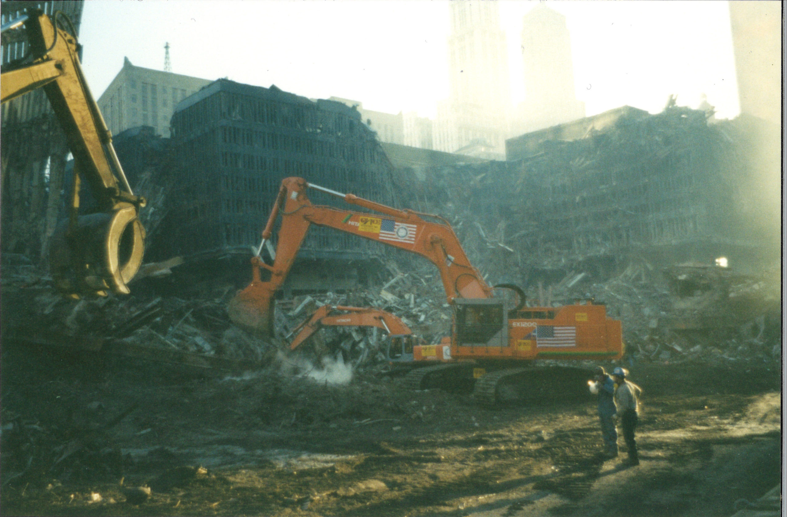Cranes Sifting Through Debris with Destroyed WTC 5 and 6 in the Back ...