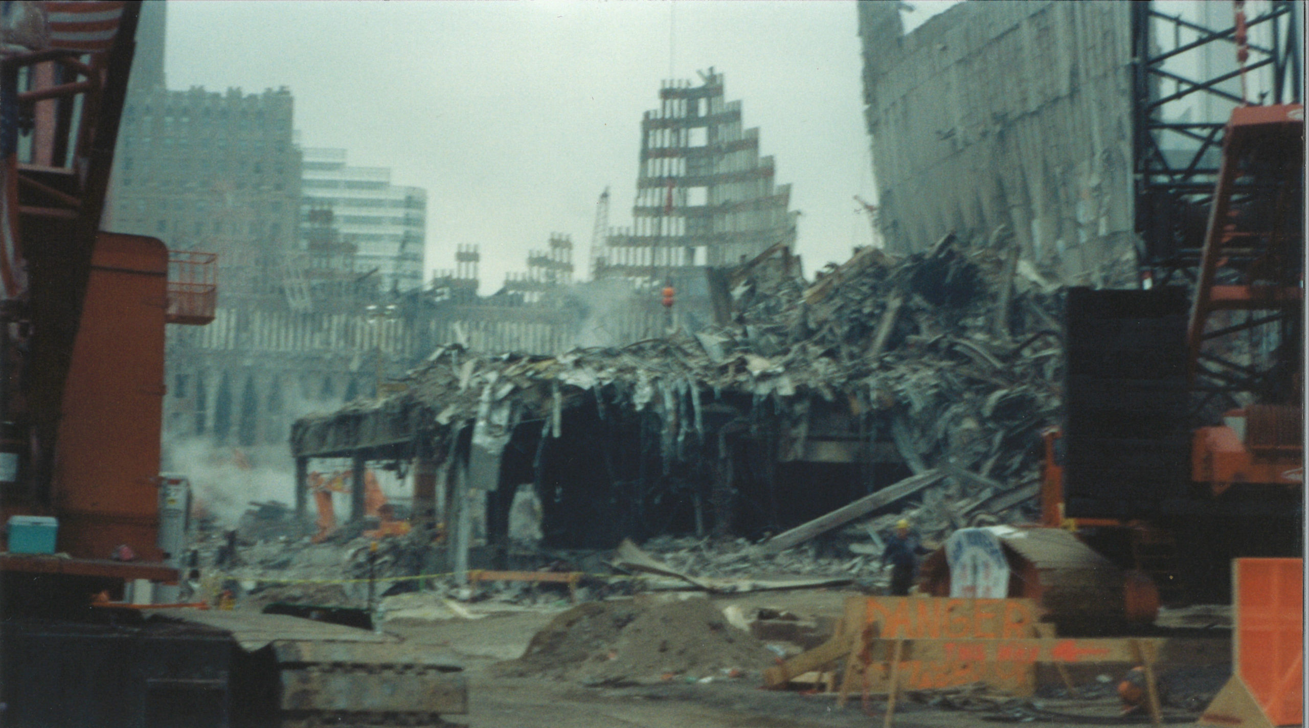 Destroyed Towers with Danger Signs - Village Preservation