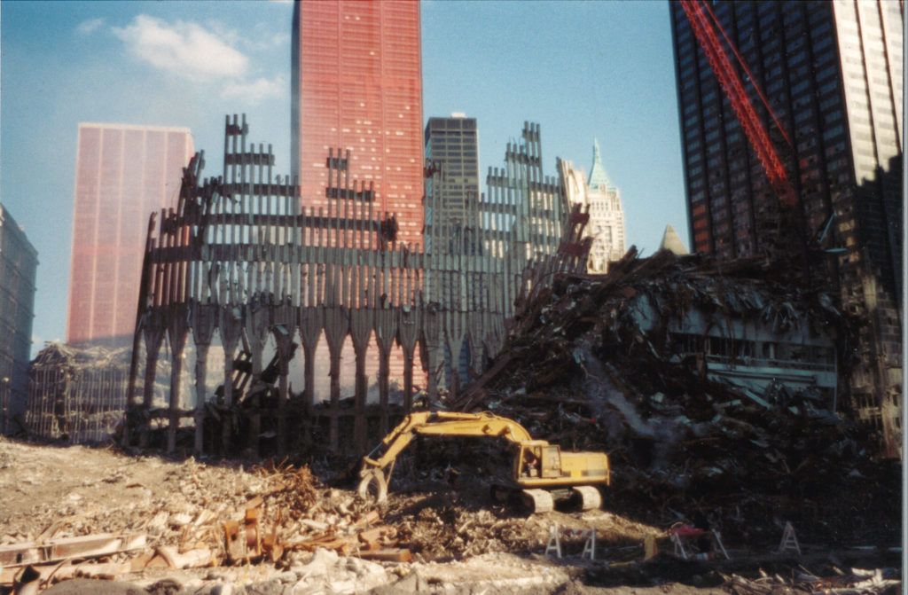 Digger Working to Clear Debris at Ground Zero in Front of the WTC ...