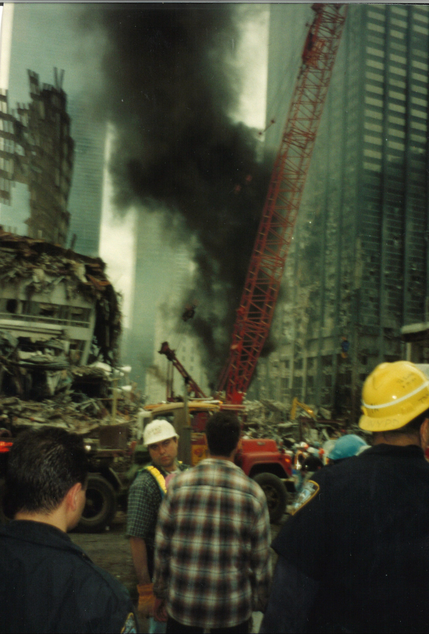 Fire between the remains of Tower 2 and the Deutsche Bank building ...