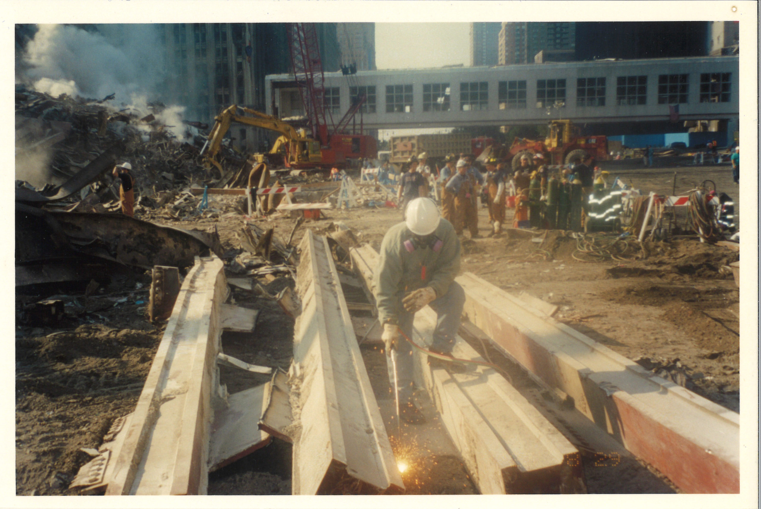 Iron Worker Breaking Steel Plates - Village Preservation