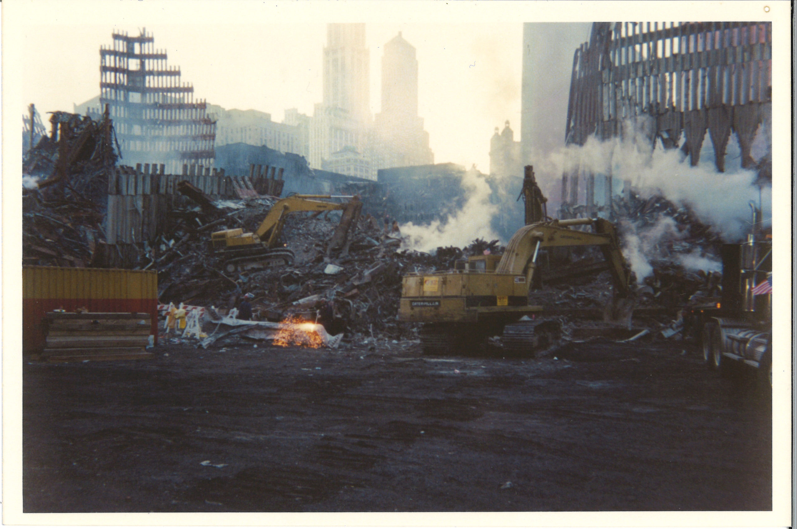Looking northeast towards Ground Zero with remains of Tower 1 on left ...