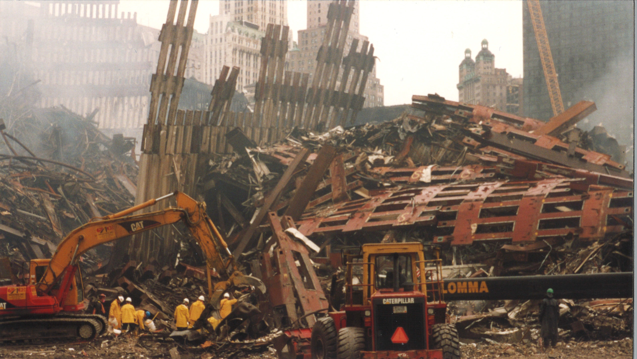 Men Working in Fallen Steel from the WTC - Village Preservation