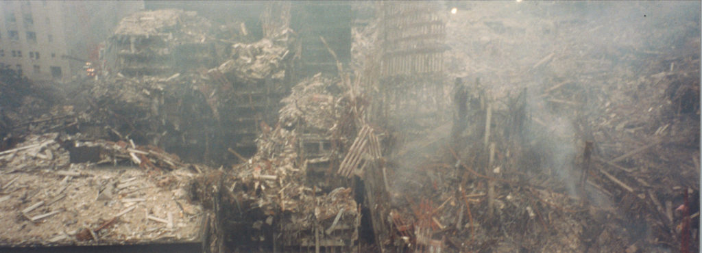 Overview of Destruction at Ground Zero with Smoke - Village Preservation