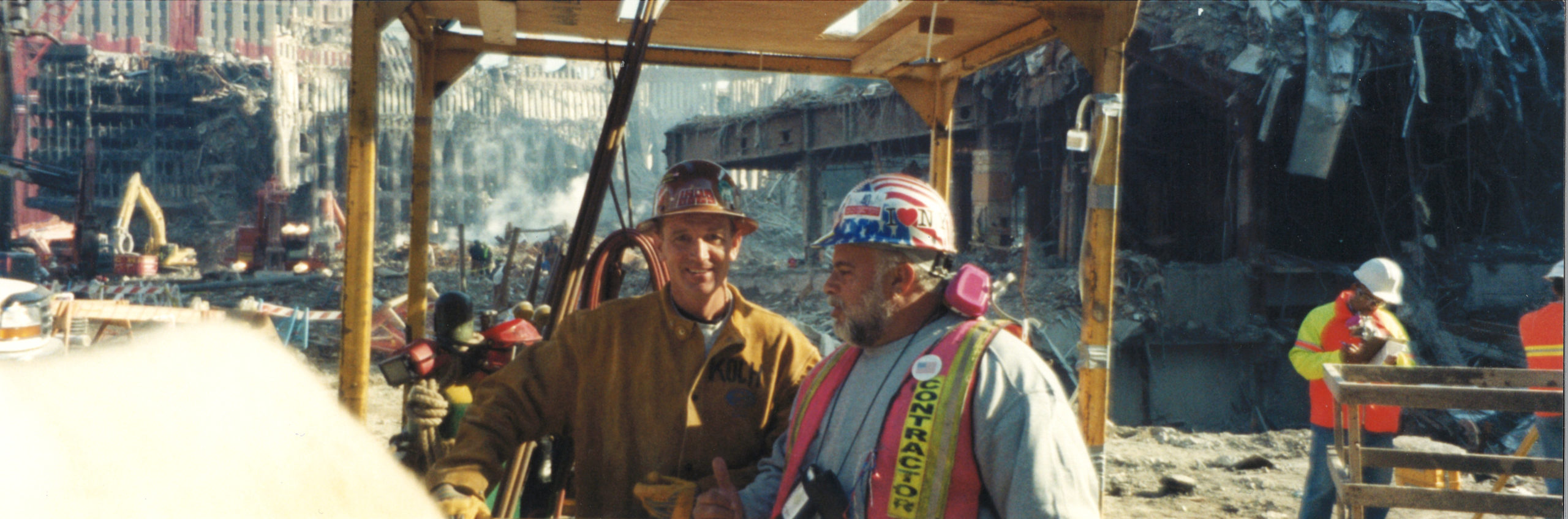 Portrait Shot of Two Workers in Crane Box - Village Preservation