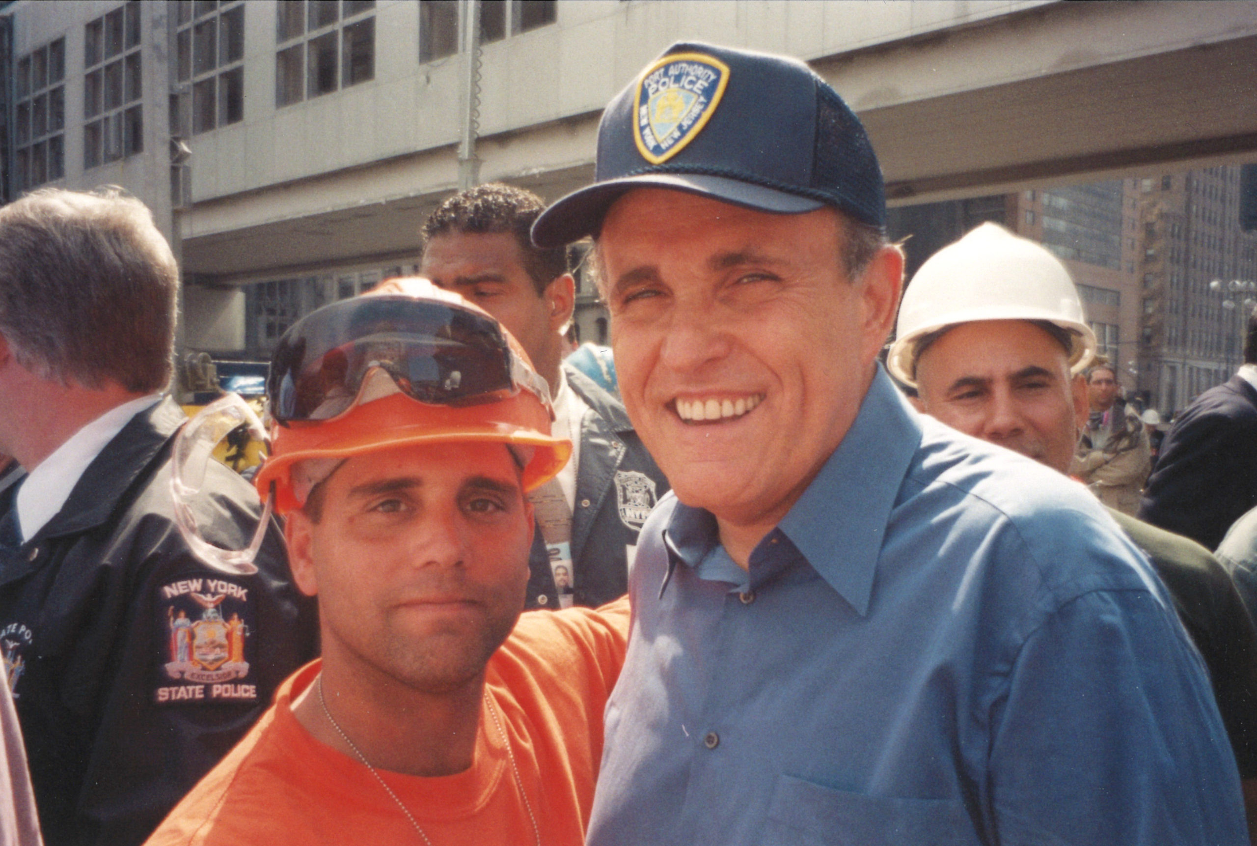 Rudy Guliani and an Unknown Worker Take a Photo at Ground Zero ...