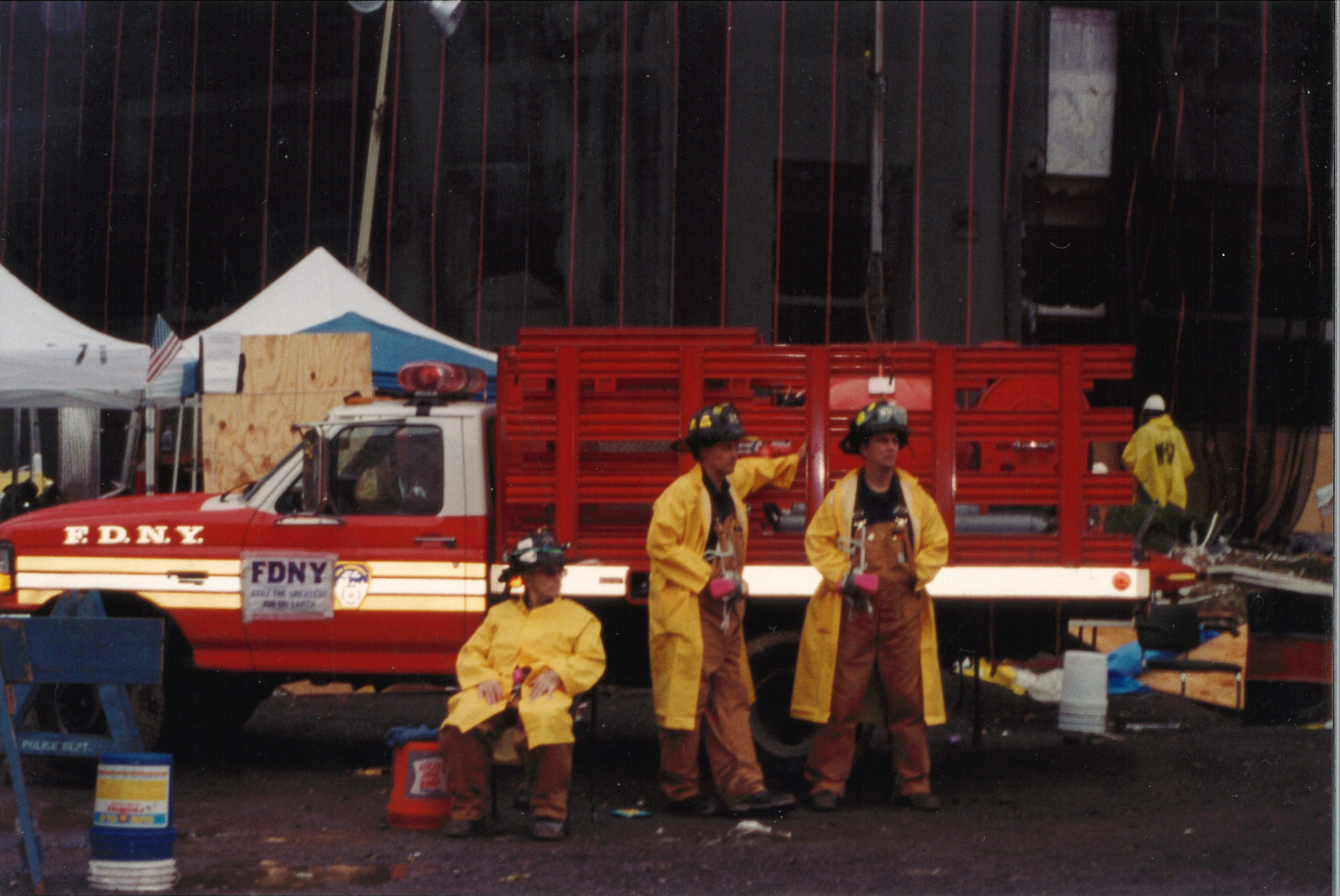 Three Fire Fighters at the FDNY Truck at Ground Zero - Village Preservation