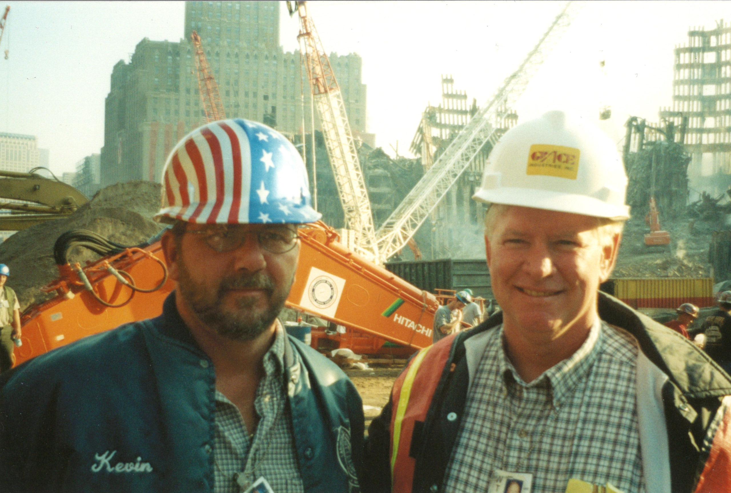 Two Workers Take Photo at Ground Zero, One is Wearing an American Flag ...