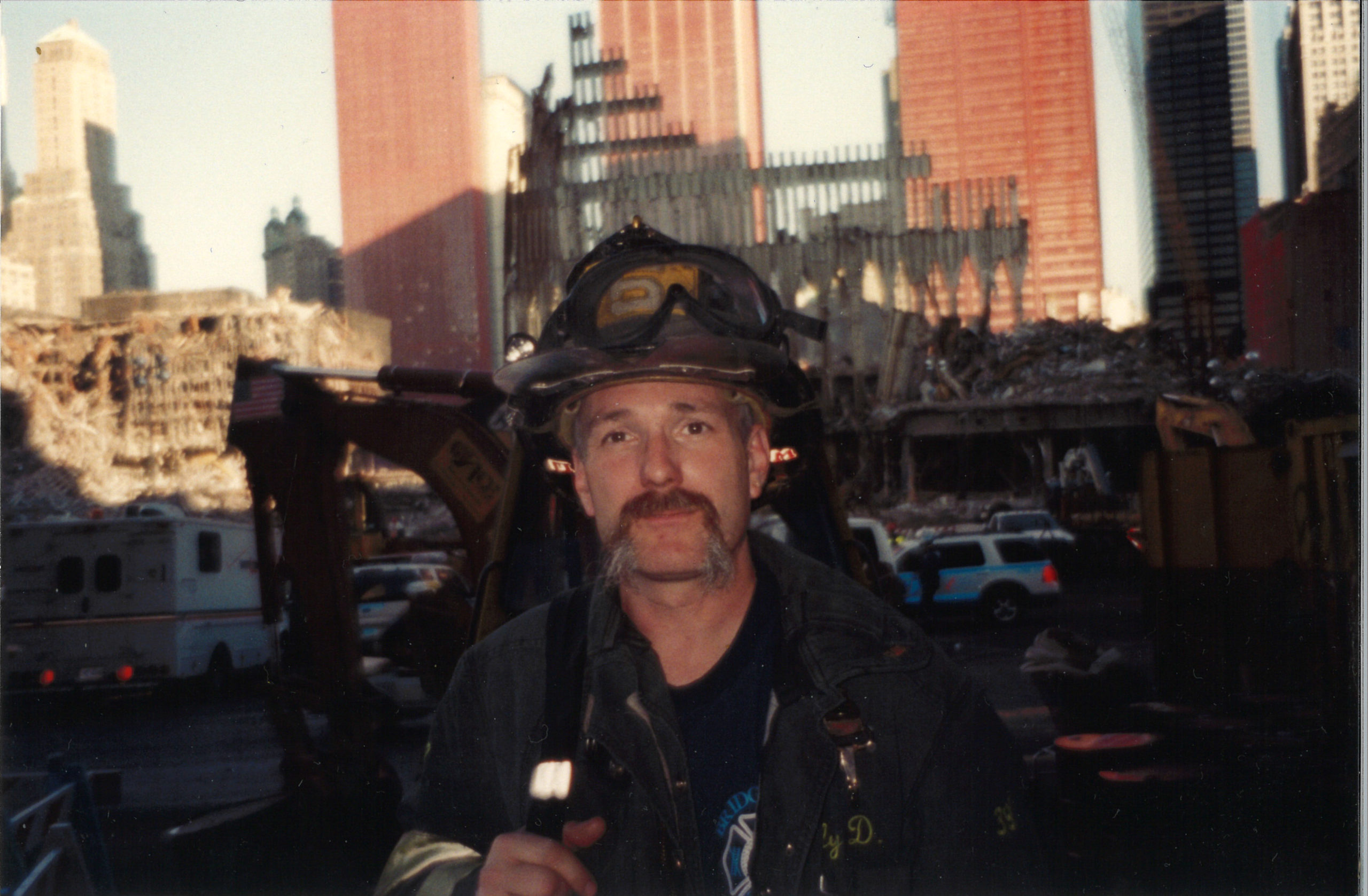 Unknown Firefighter in front of Ground Zero - Village Preservation
