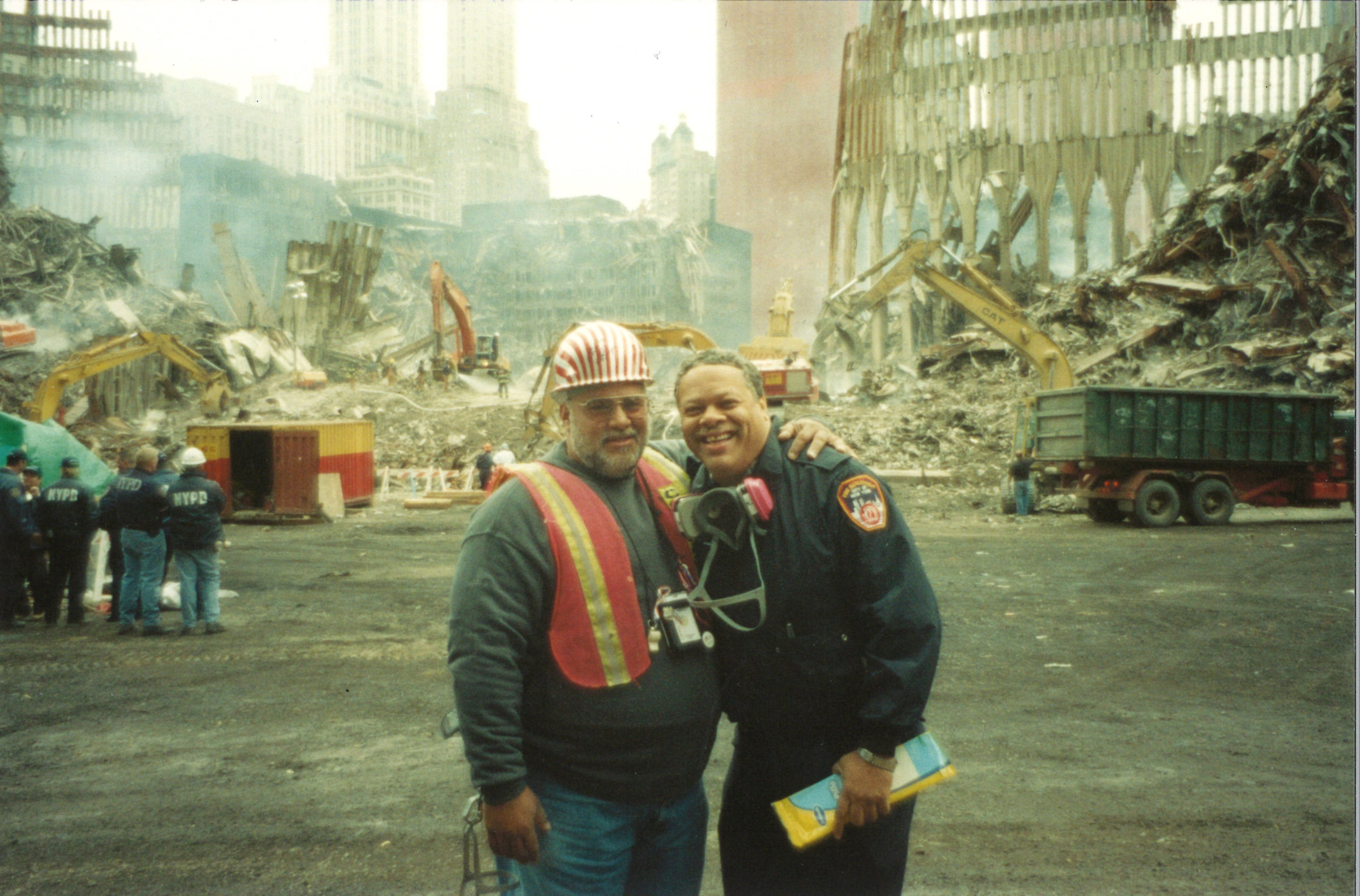 Unknown Local 731 Contractor and an FDNY Firefighter Take Photo ...