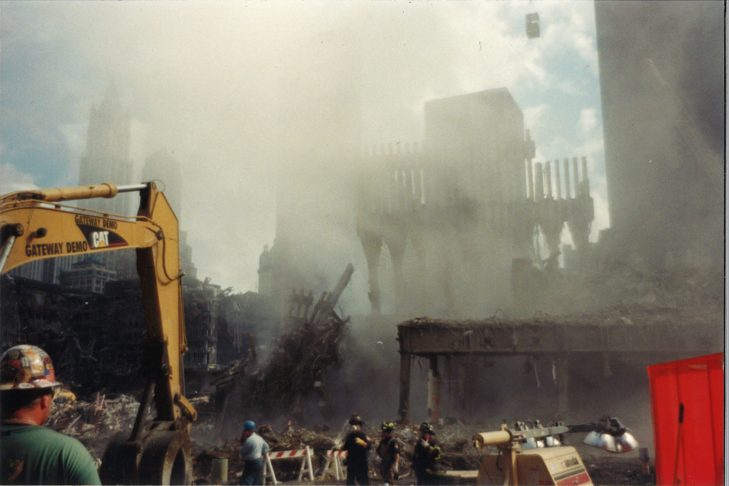 Workers at Ground Zero remains of Tower 2 on right - Village Preservation