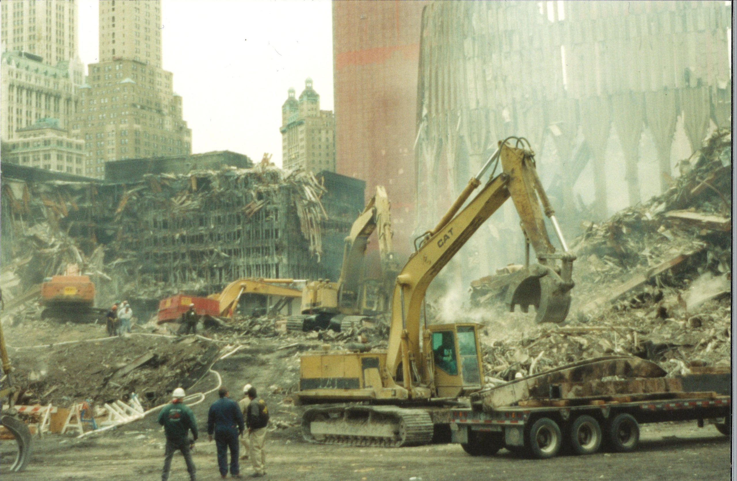 Workers on the Pile with destroyed WTC Tower and WTC 5 in the ...