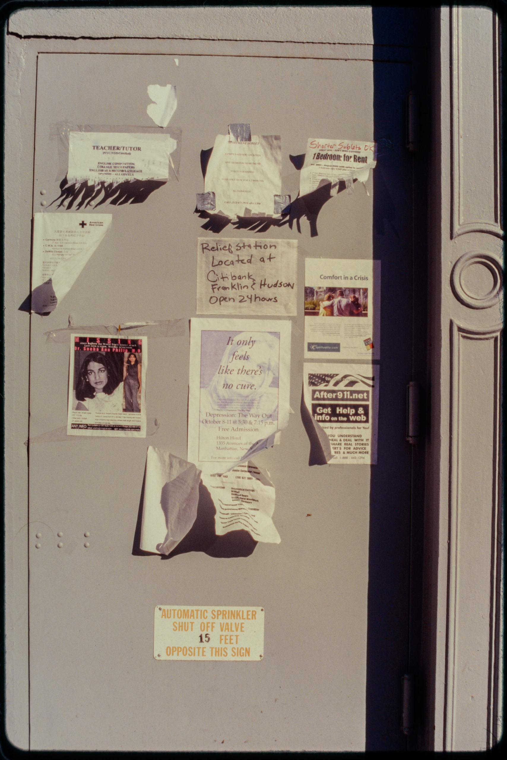 Missing Persons, Relief Station, and Support Groups Advertised on Wall ...