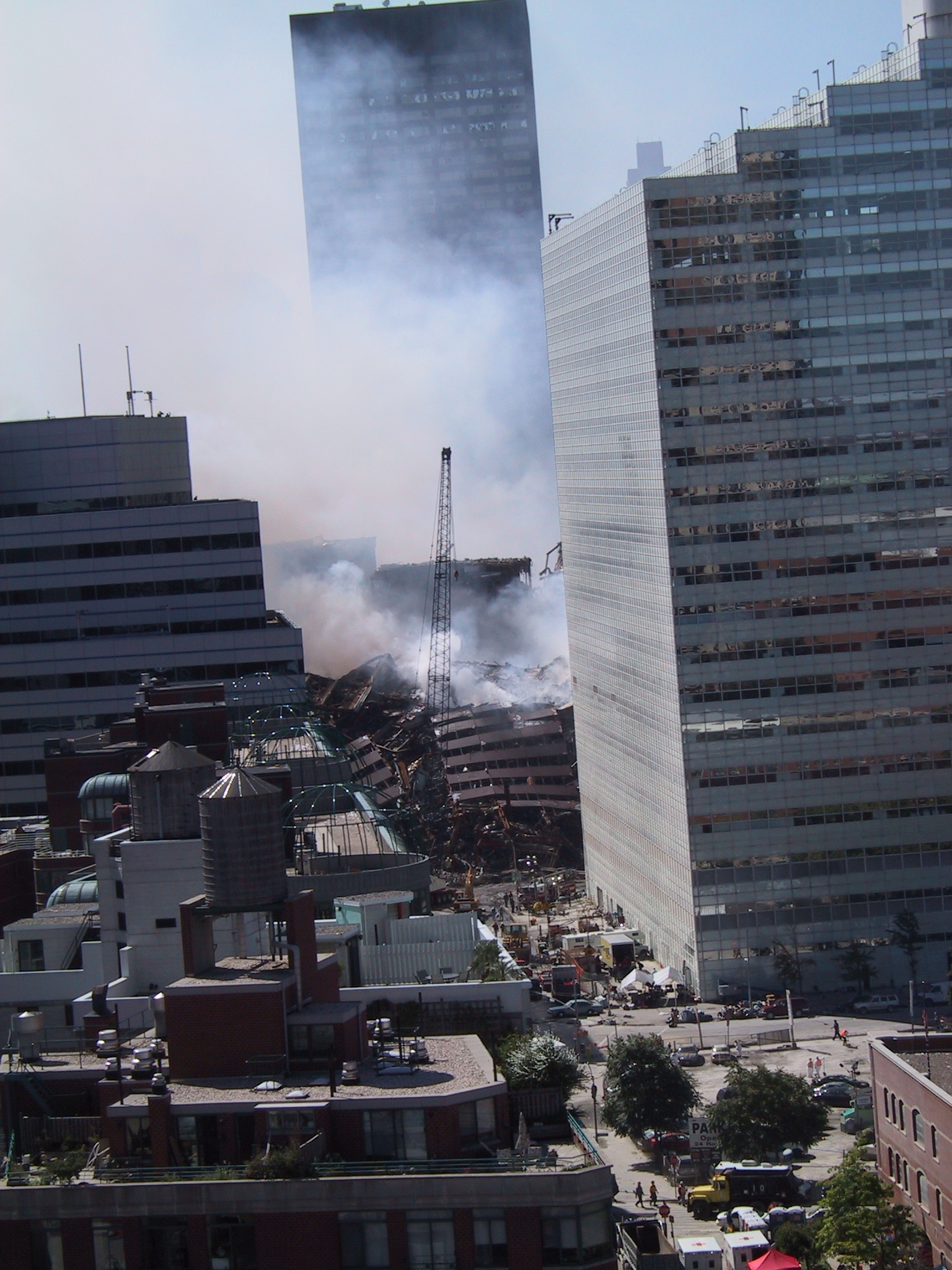 Crane Working Through Smoke at WTC3 from Greenwich Street - Village ...