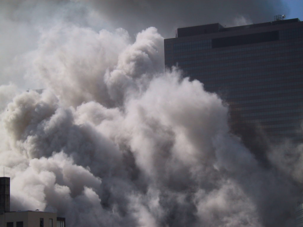 Thick Smoke Covering the Ground and Surrounds the Buildings as the ...