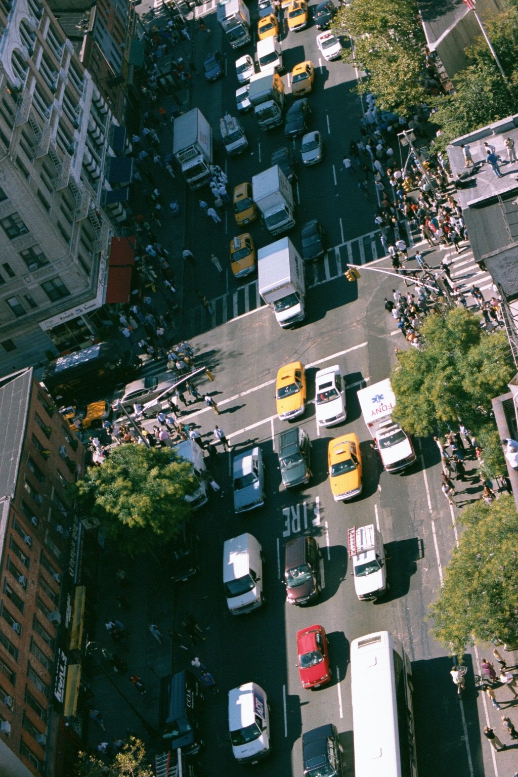 View of 6th Ave and 12th Street from above, showing crowds watching 9/ ...