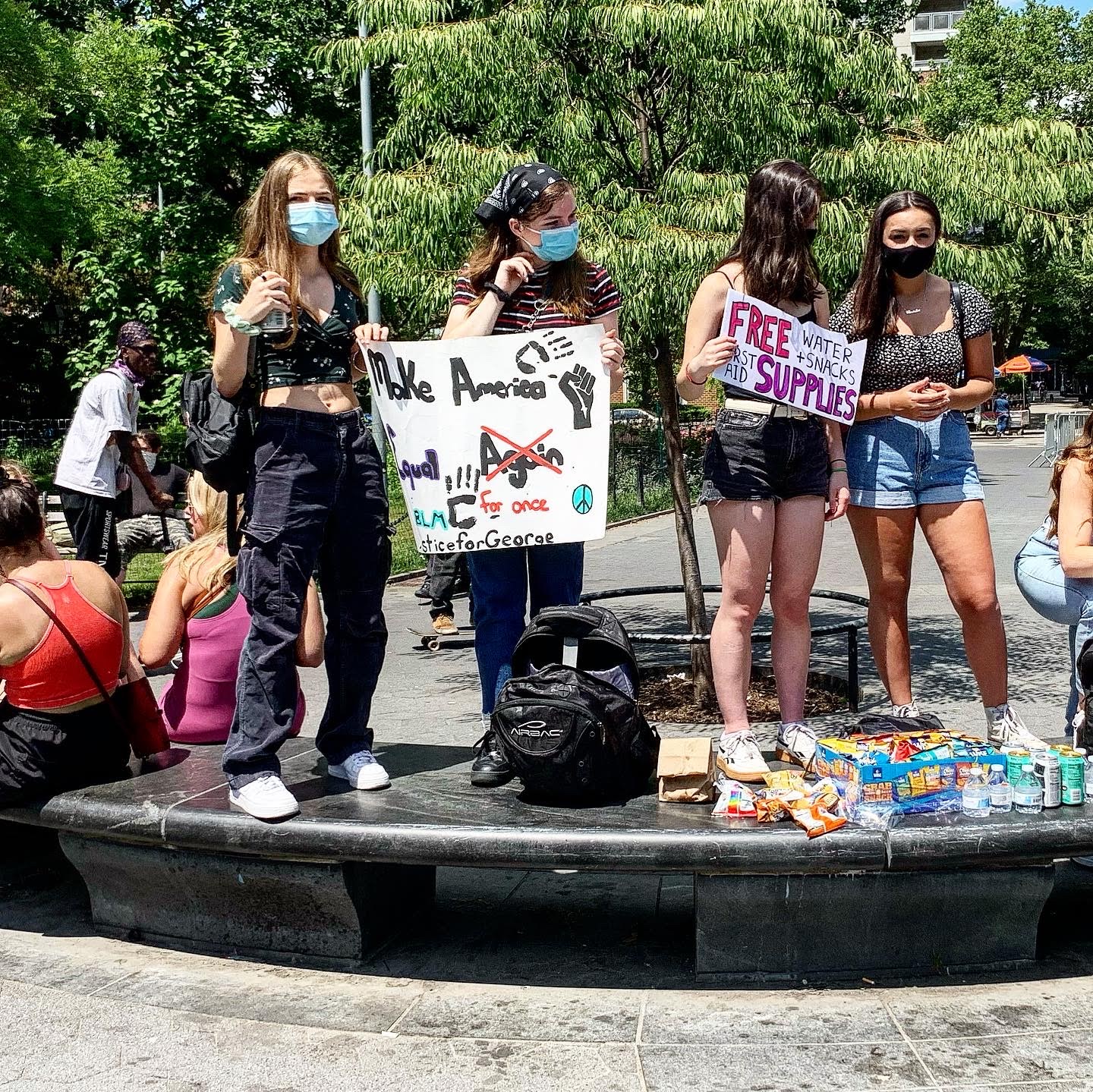 Masked Protestors, “Make America Equal For Once, “Free Water + First ...