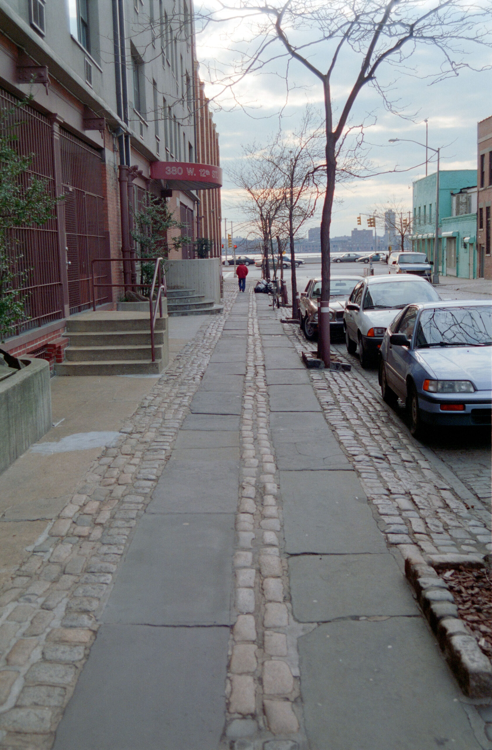 Cobblestone sidewalk in front of 380 W. 12th St. btw. Washington + West ...
