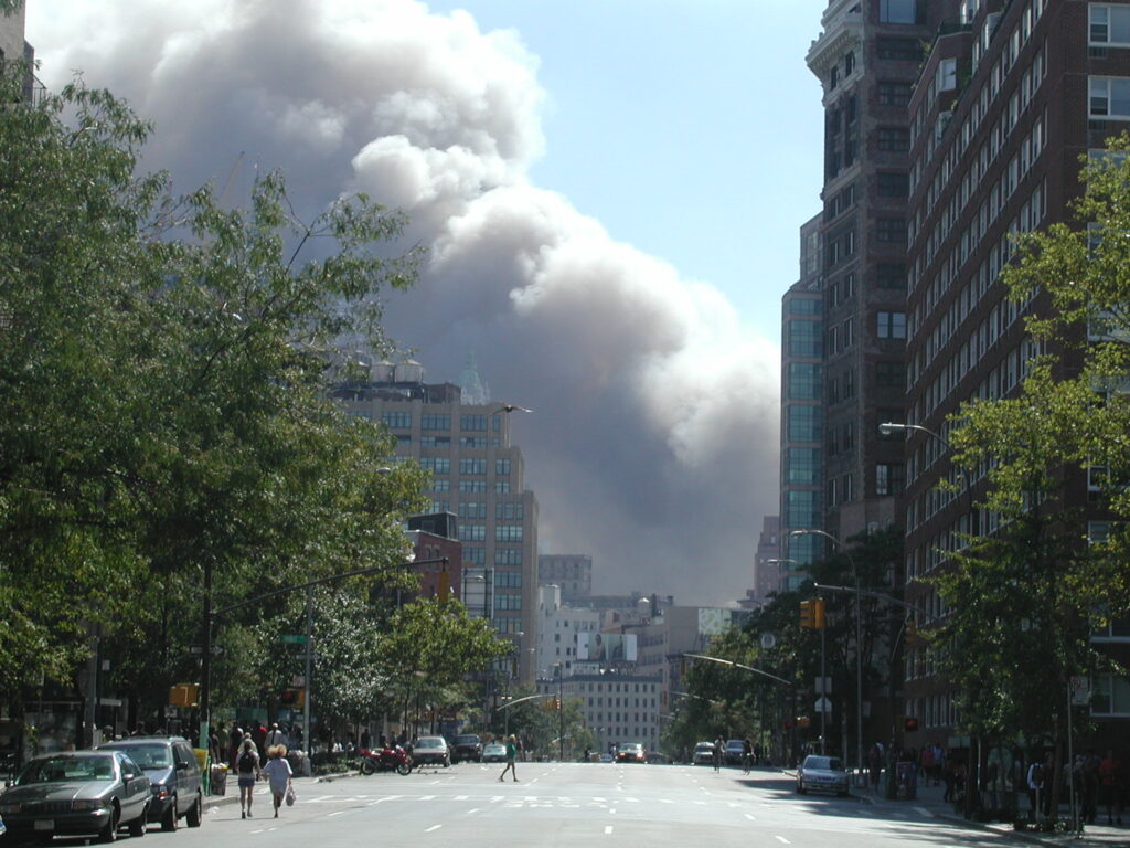 Smoke from September 11th attacks as seen from Sixth Avenue and Prince ...