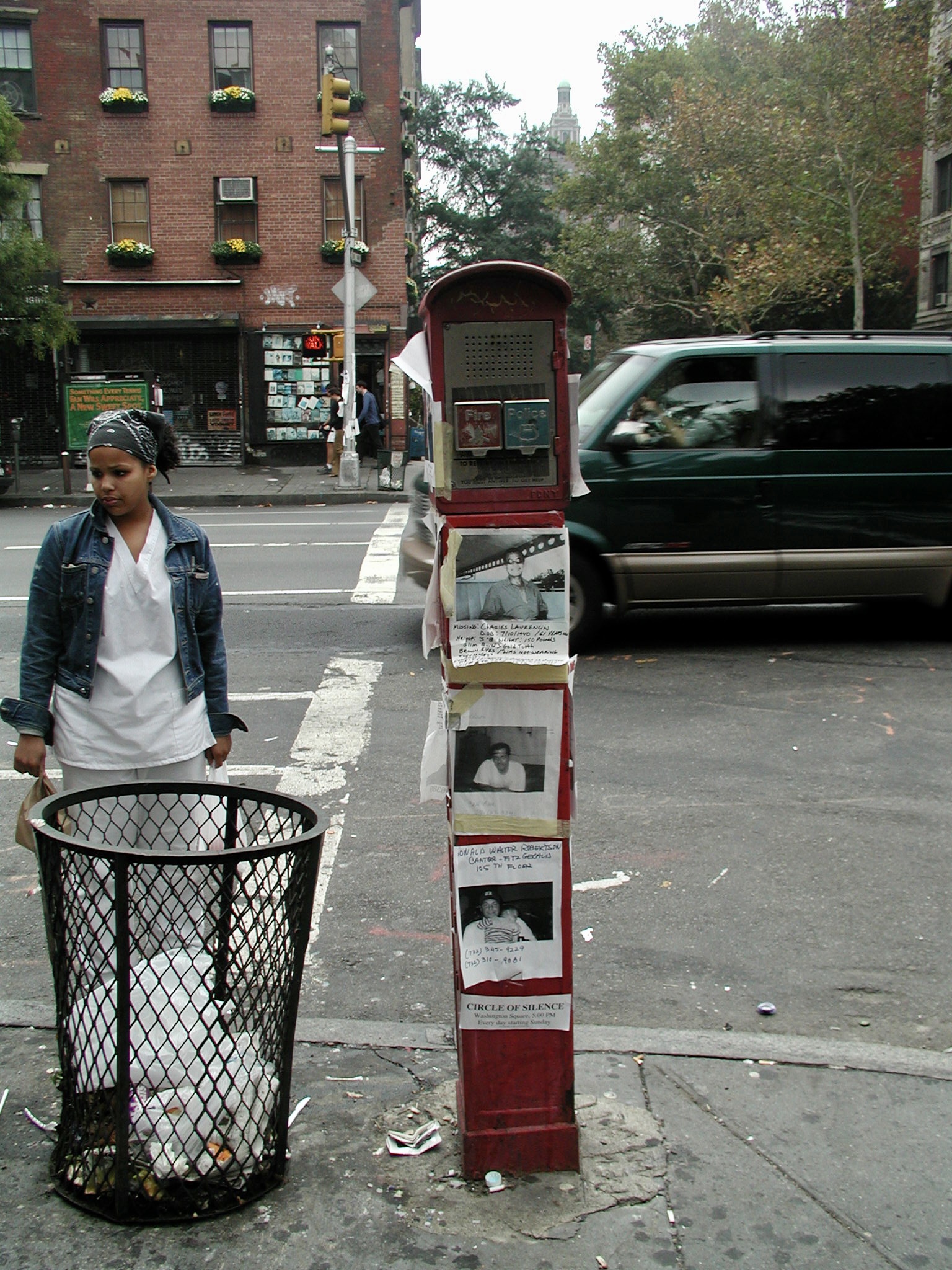 Missing person signs on emergency call box at West 11th Street and ...