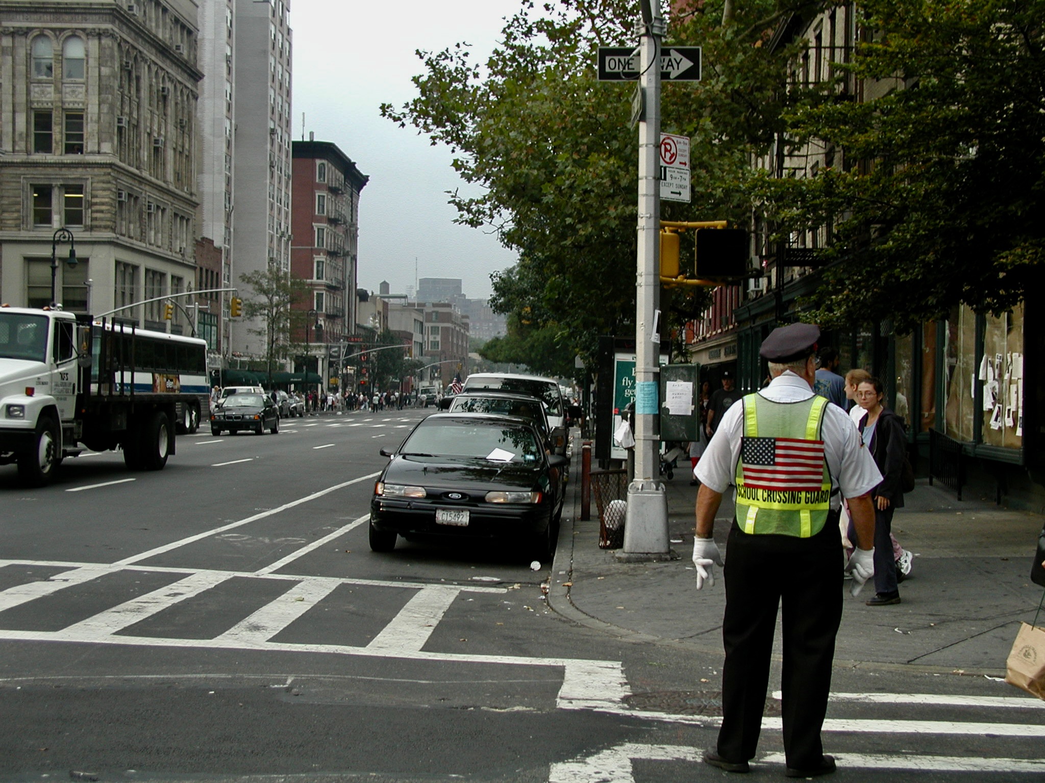 School crossing guard with American flag, Sixth Avenue and West 11th ...