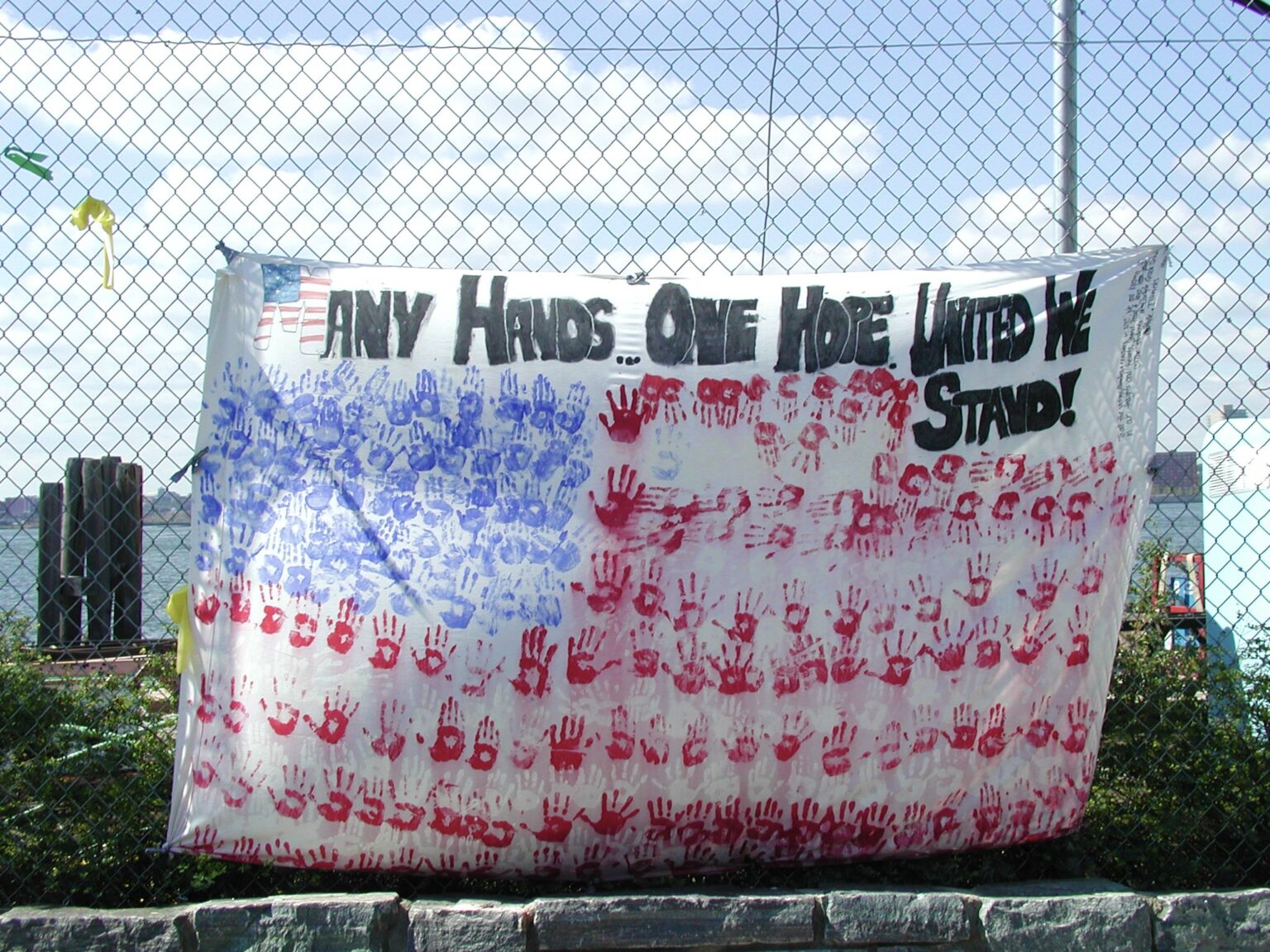 “Many Hands. One Hope. United We Stand” banner along Hudson River ...