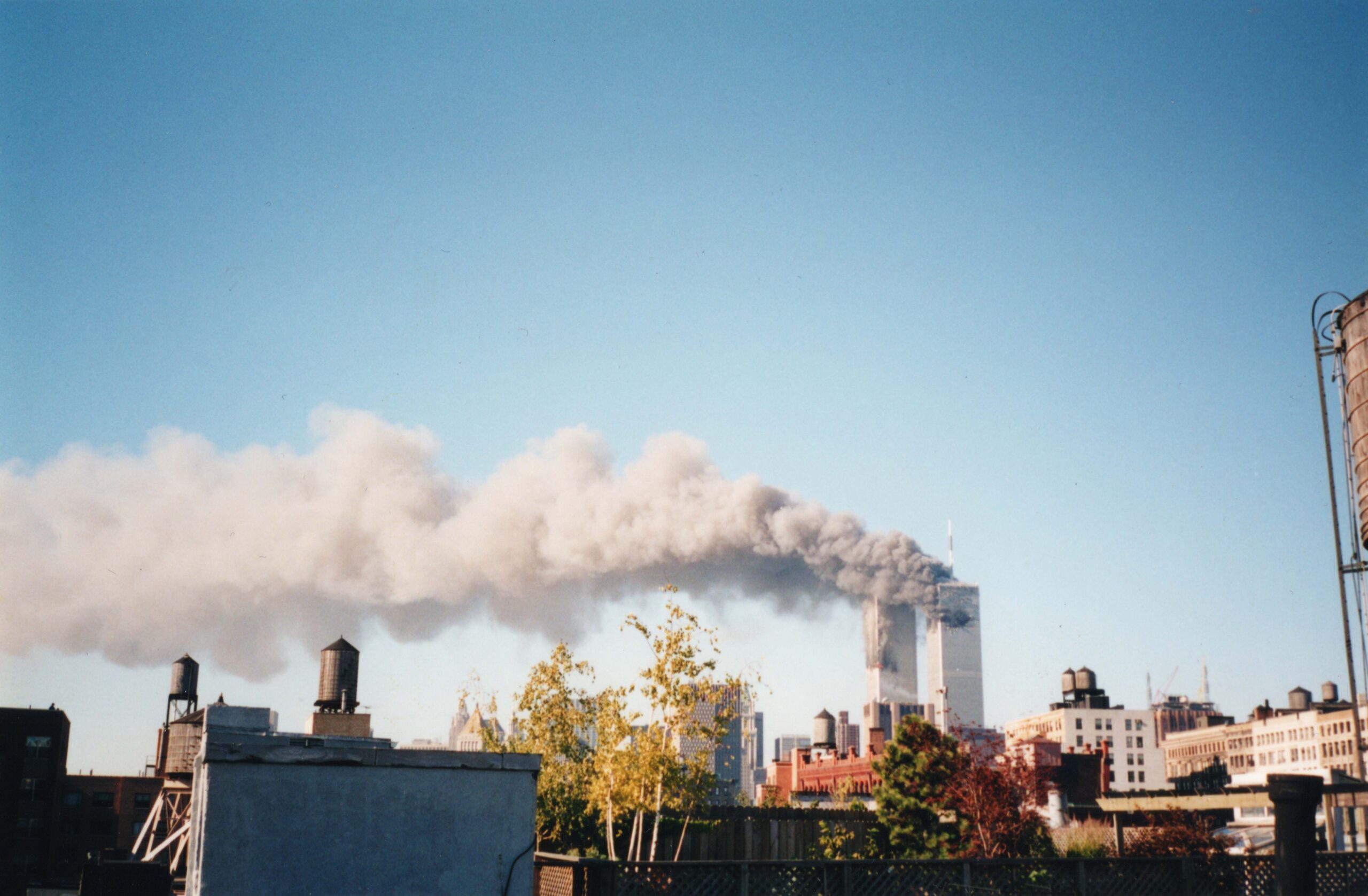 View from roof, 39 Bond Street both WTC towers with smoke after being ...